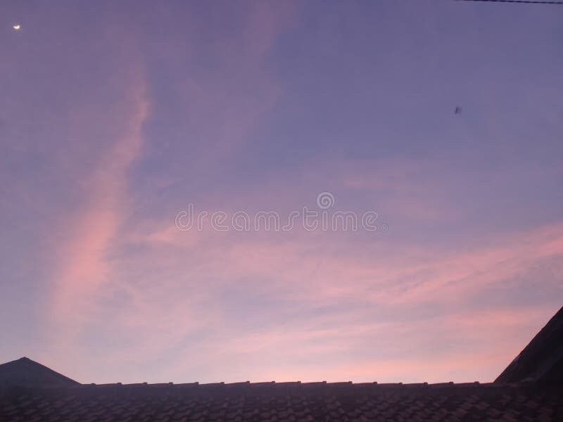 Pink Sky and Little Moon stock photo. Image of roof - 221919330
