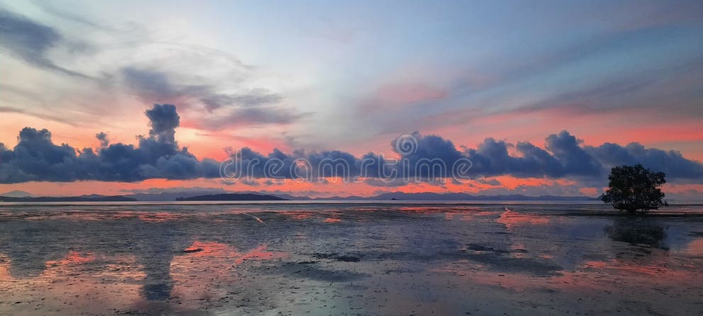 Pink sky while sunrise stock image. Image of water, painting - 191964597