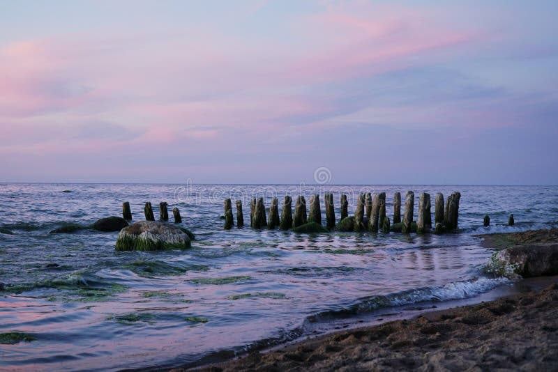 Pink Sky Sunset Old Bridge Beams Breakwater Sea Stock Photo - Image of ...