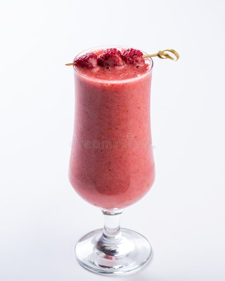 Pink Smoothie in a Tall Glass Decorated with Raspberry Berries on White ...