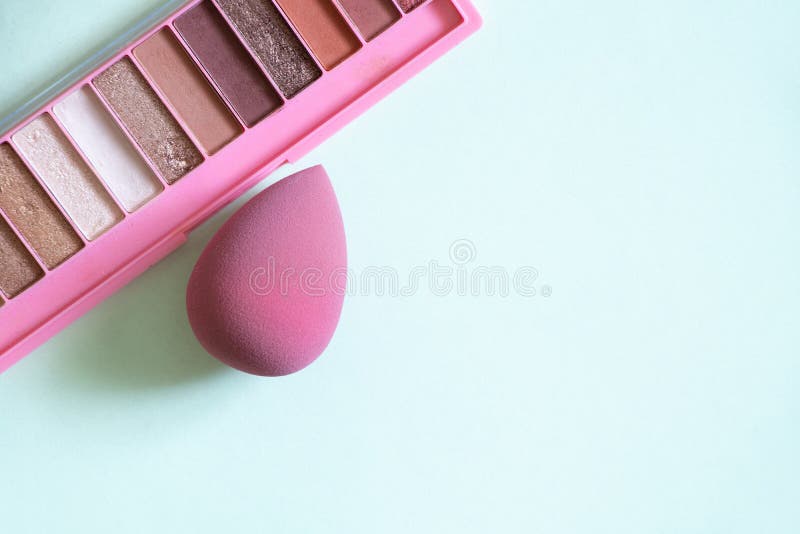 Pink Sponge and Multi-colored Shadows Lie on a Colored Background ...