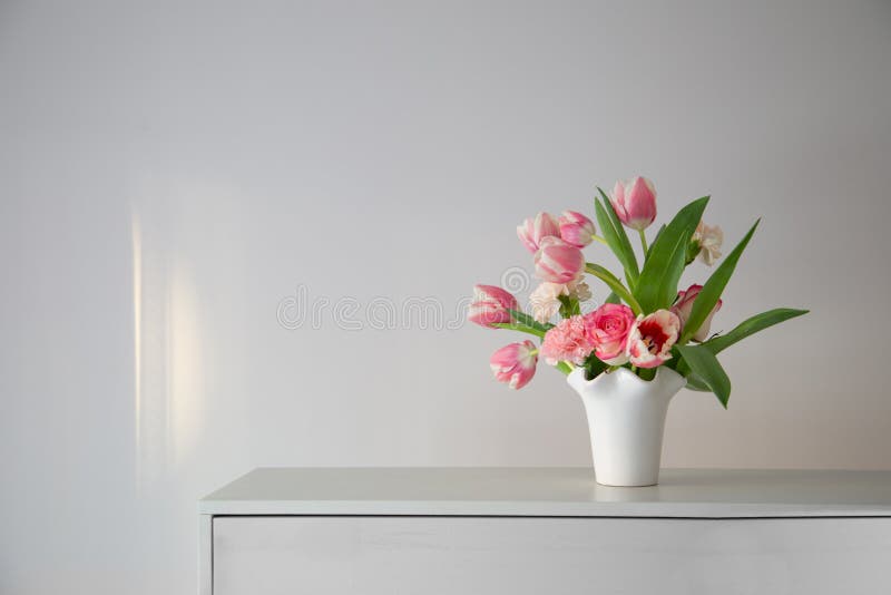 Pink Spring Flowers in White Ceramic Vase in Modern Home Interior Stock ...
