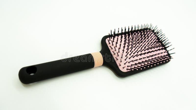 The Pink Square Comb for Styling Hair Stock Photo - Image of finger ...