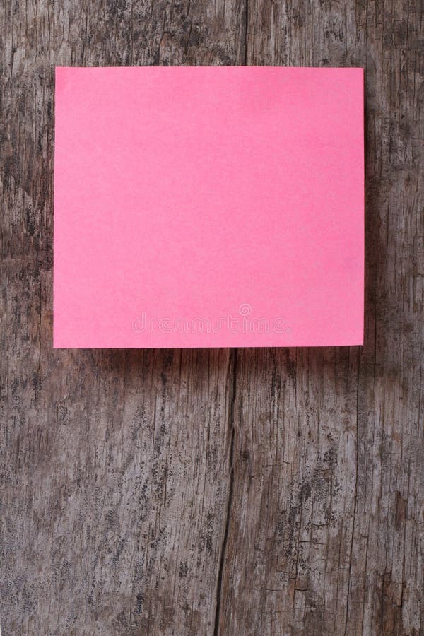 Pink Sticker on an Old Wooden Table. Close Up Stock Photo - Image of ...