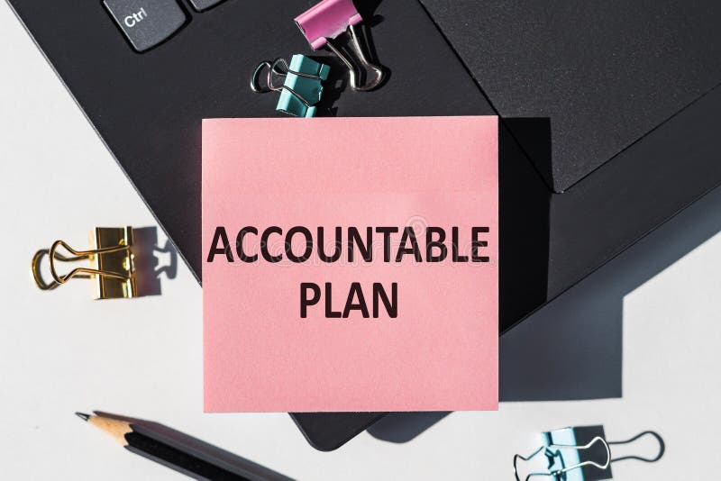 Pink Sticky Note with Accountable Plan Written on it beside a Laptop ...