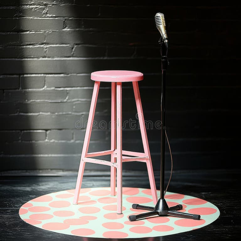 Pink Stool and Microphone on Stage with Polka Dot Pattern in Spotlight ...