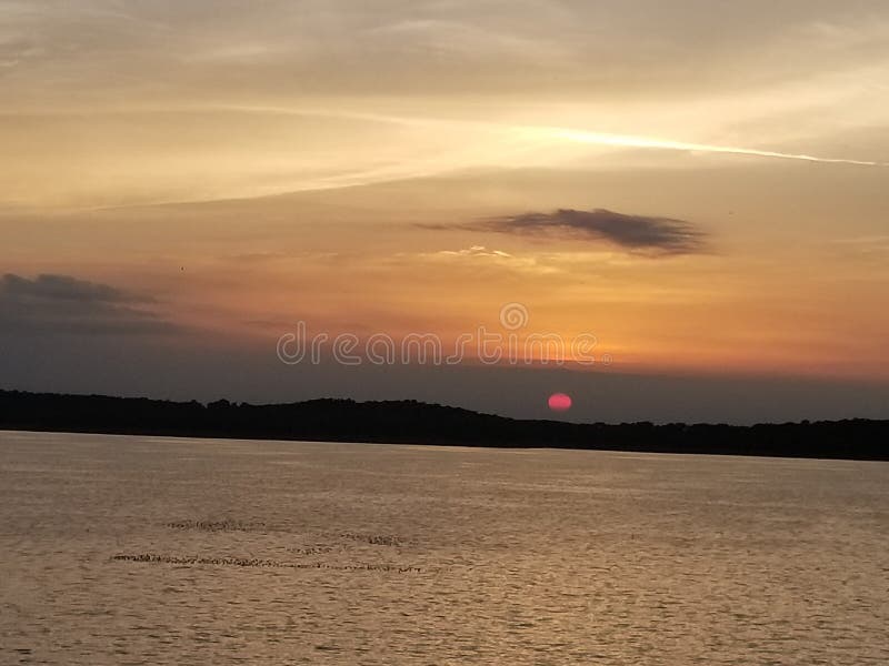 Pink sun stock photo. Image of pink, lake, sunset, keystone - 117592526