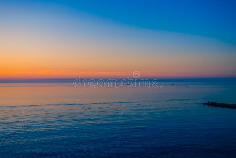Sunrise Over a Quiet Calm Sea. Stock Photo - Image of morning, light ...