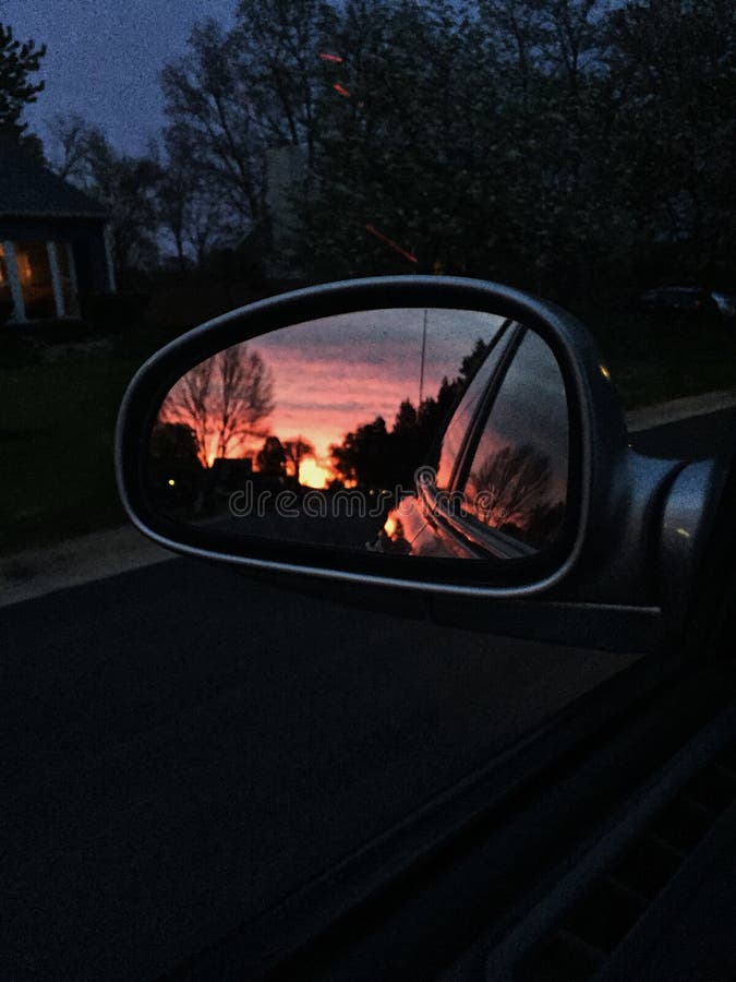 Pink Sunset through Car Mirror Stock Photo - Image of driving, sunset ...