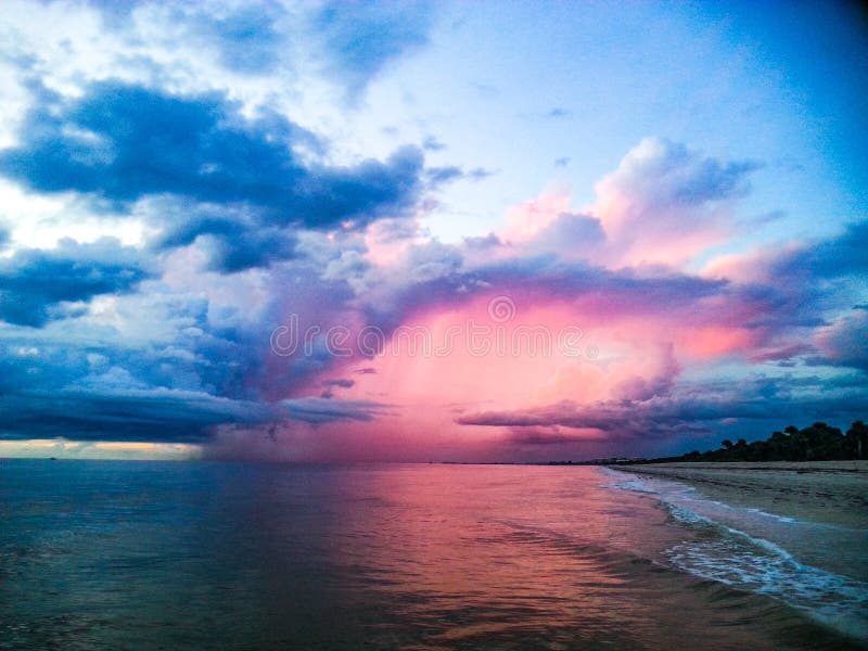 Pink Sunset Clouds Over Beach. Stock Image - Image of vibrant, bright ...