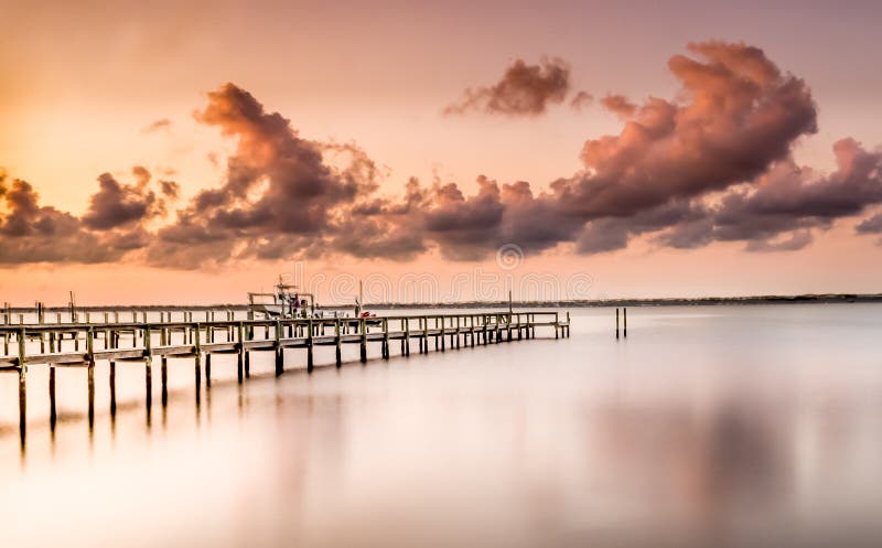 A Pink Sunset stock photo. Image of emerald, pier, lake - 44641600