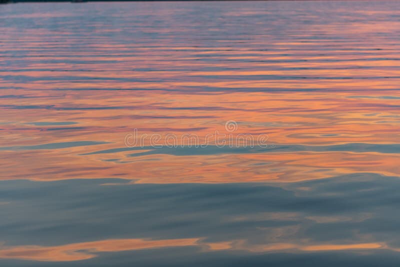 Pink Sunset Light Reflects on Ripples Stock Image - Image of light ...