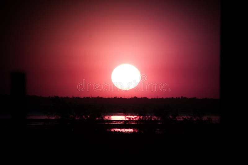 Pink sunset near pond stock image. Image of camp, birds - 97018561