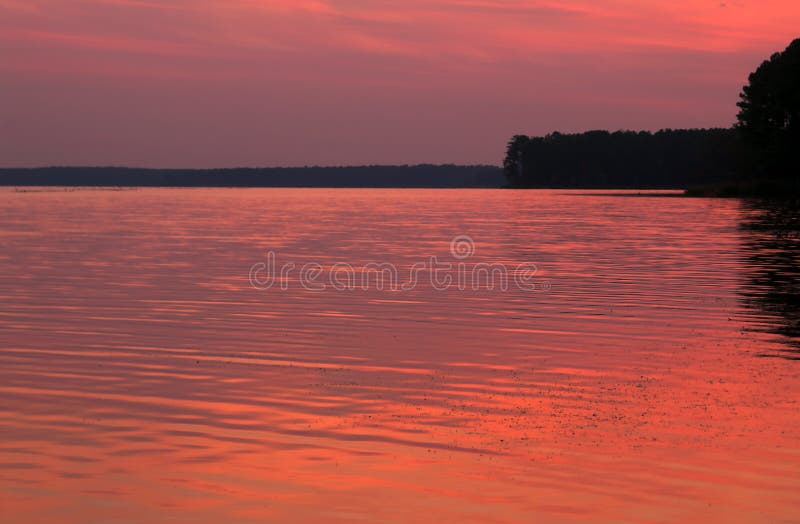 Pink sunset over water stock image. Image of nature, sunny - 3594053