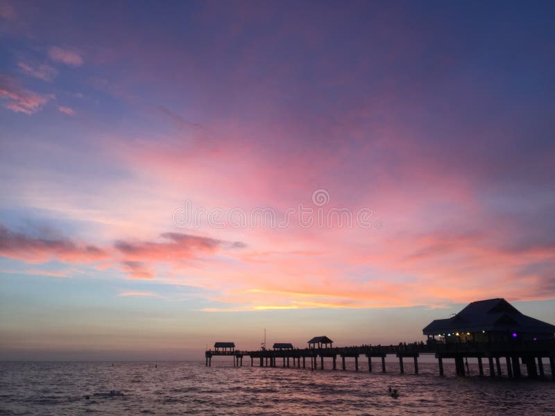 Pink Sunset with Silhouette of a Dock Stock Photo - Image of sunset ...
