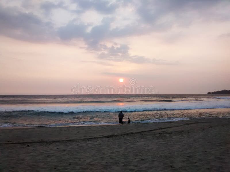 Pink Sunset Sky on the Beach West Java, Indonesia Stock Photo - Image ...