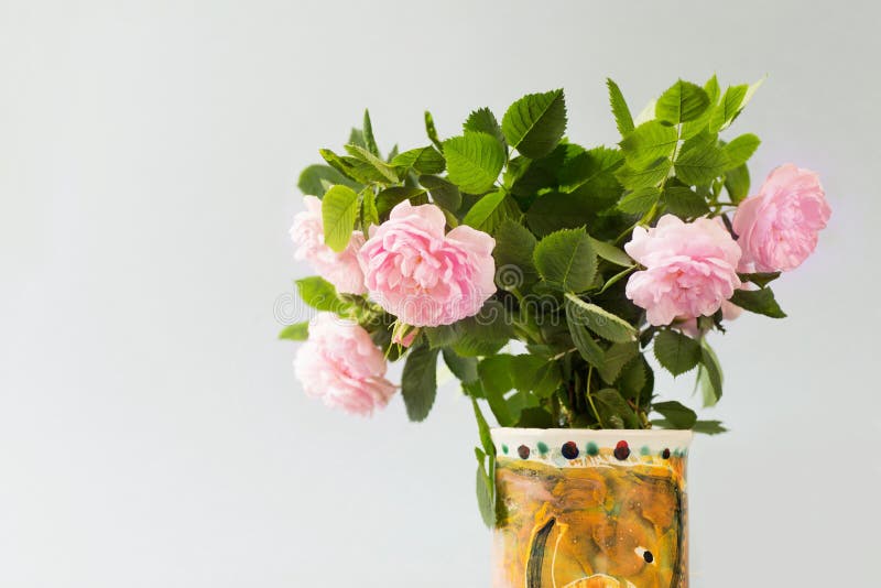 Pink Tea Roses in Vase on Gray Background. Stock Photo - Image of bunch ...