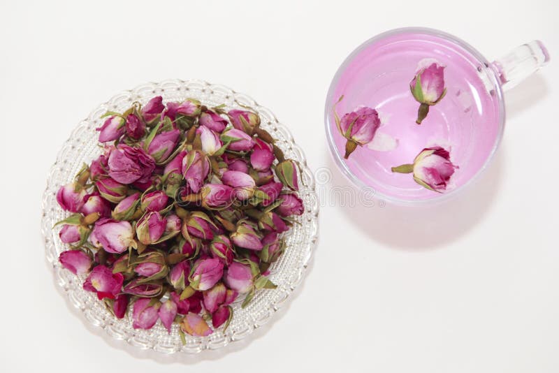 Pink Tea with Small Pink Rose Buds in a Transparent Mug and in a ...