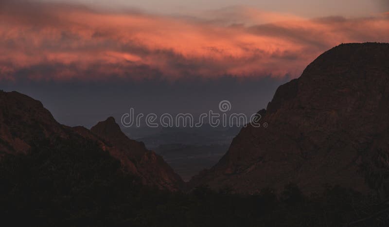 Pink Tinged Clouds Hover Over the Window in Big Bend Stock Image ...