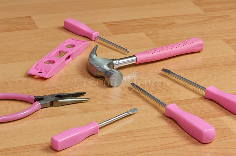Pink tools on wood stock image. Image of table, play - 49898173
