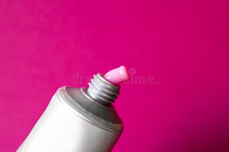 Pink Toothpaste in the Metallic Silver Tube. Pink Hand Cream Tube on ...