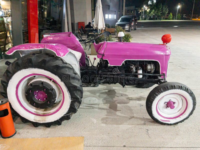 Pink Tractor in Front of the Store Stock Image - Image of green ...