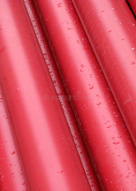 Pink tubes stock image. Image of shiny, pink, stack, plumbing - 11734041