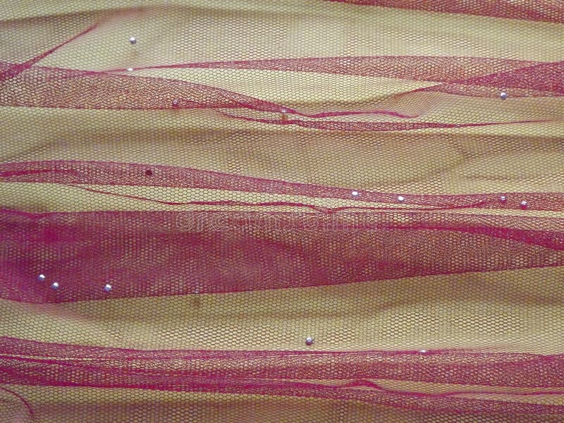 Pink Tulle in a Fold on a Yellow Background As a Backdrop Stock Photo ...