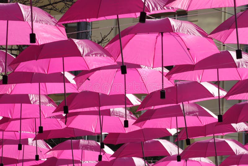 Pink umbrellas stock image. Image of hanging, cloth, violet - 27296659