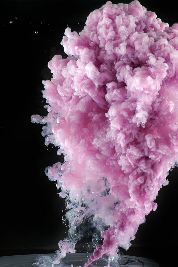 Pink Vertical Cloud of Paint in Water on a Dark Background Stock Photo ...