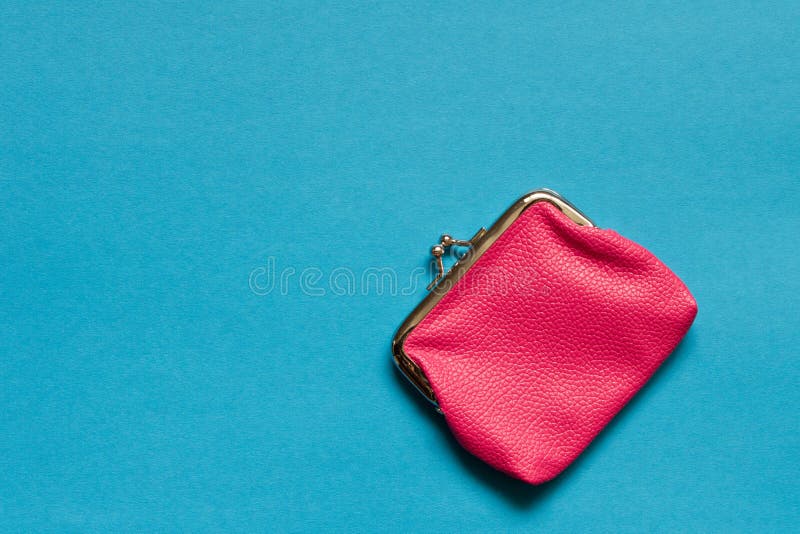 Pink Wallet on Blue Background . Close Up Stock Photo - Image of ...