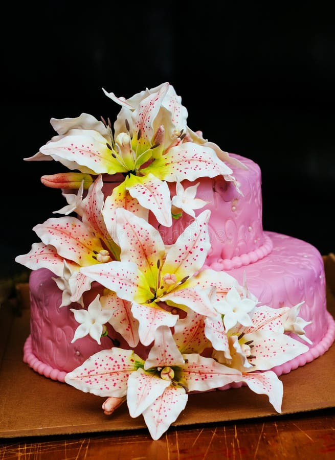 Pink Wedding Cake with Lily Stock Photo - Image of wedding, lily: 212193430