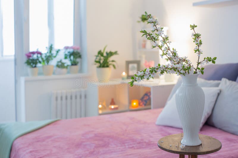 White Interior of Bedroom with Spring Flowers Stock Photo - Image of ...