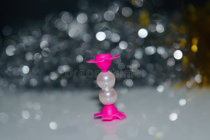 Pink and White Plastic Objects with Glowing Lights Stock Image - Image ...