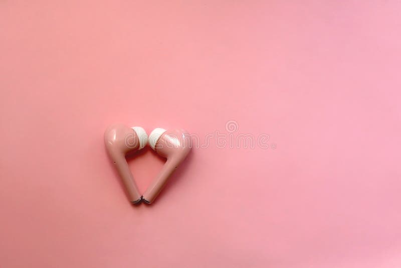 Pink Bluetooth Earphones stock photo. Image of concept - 240540044
