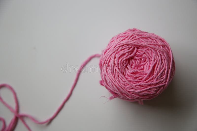 Pink Wool Yarn Placed on a White Base, Will Be Used for Knitting. Stock ...