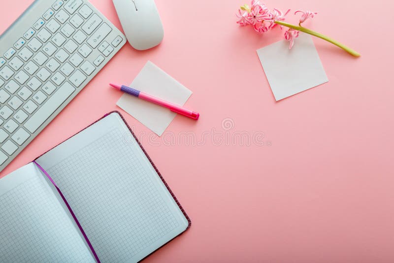 Pink Work Desk with Female Hand Writes Notes in Notebook at Workplace ...