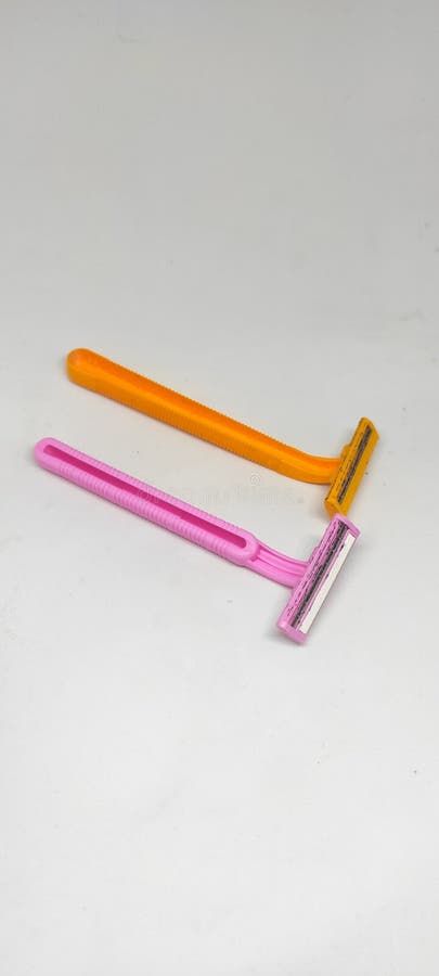 Pink and Yellow Disposable Razor for Shaving Mustache, Razor with White ...