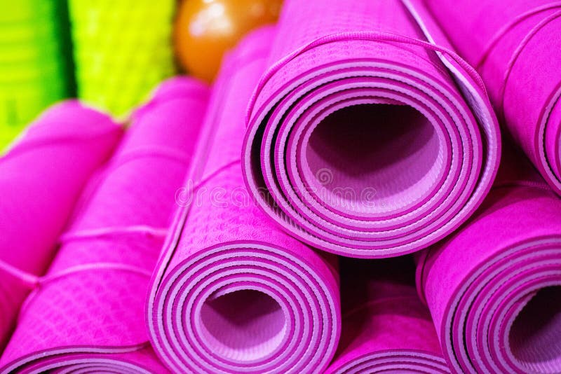 Pink Yoga Mats on the Floor in a Gym Stock Photo - Image of health ...