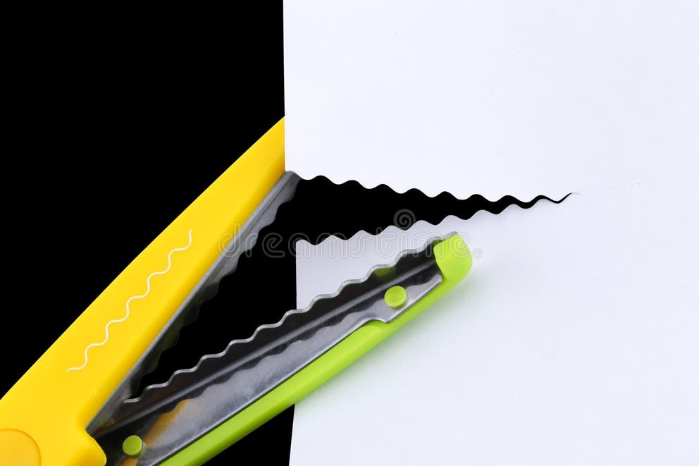 Yellow Green Pinking Scissor Shears Cutting a White Piece of Paper ...