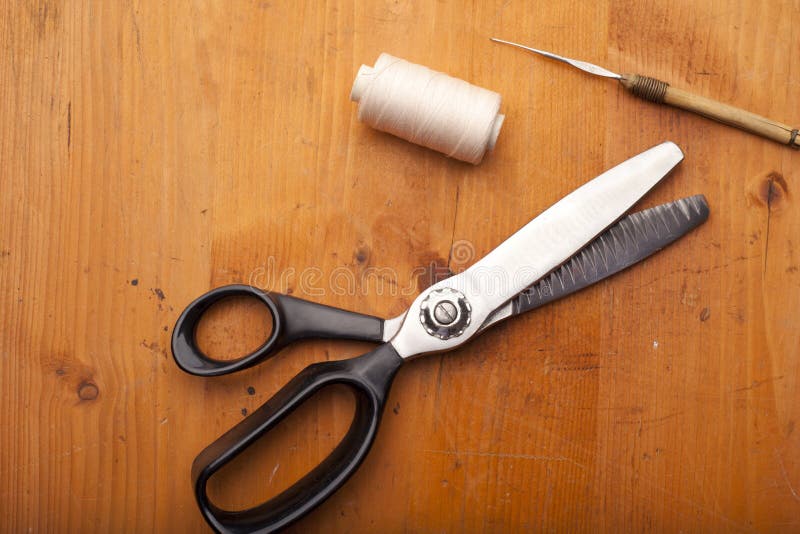 Pinking Shears with Spool and Crochet Tool Craft Concept on Wood Stock ...