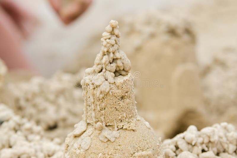 The pinnacle of the sand stock photo. Image of closeup - 58105552