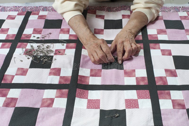 Pinning Quilt Top To Backing. Stock Image - Image of paiseley, dots ...