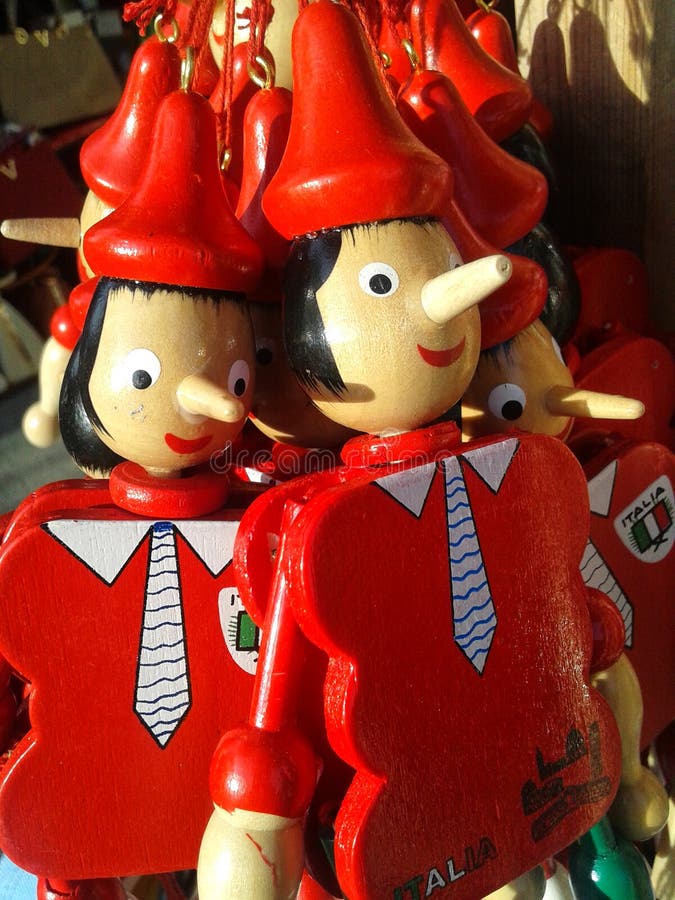 Pinocchio, red puppet editorial stock photo. Image of fable - 56707658