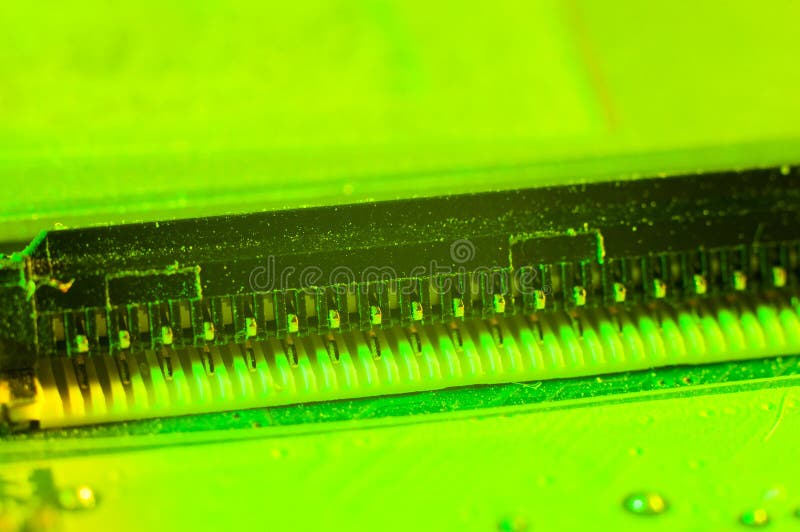 Pins for Connecting To Printed Circuit Board Close-up in Green Light ...