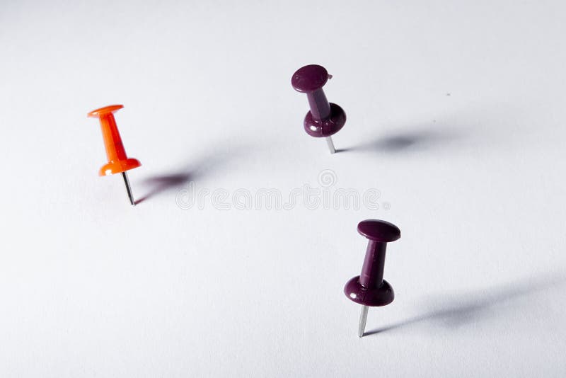 Pins stuck into the paper stock photo. Image of organizer - 130505878