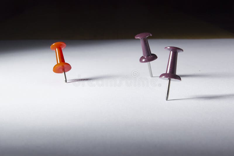 Pins stuck into the paper stock image. Image of pushpin - 134740735