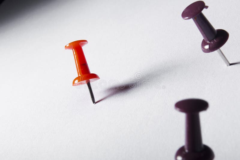 Pins stuck into the paper stock image. Image of deadline - 133640955