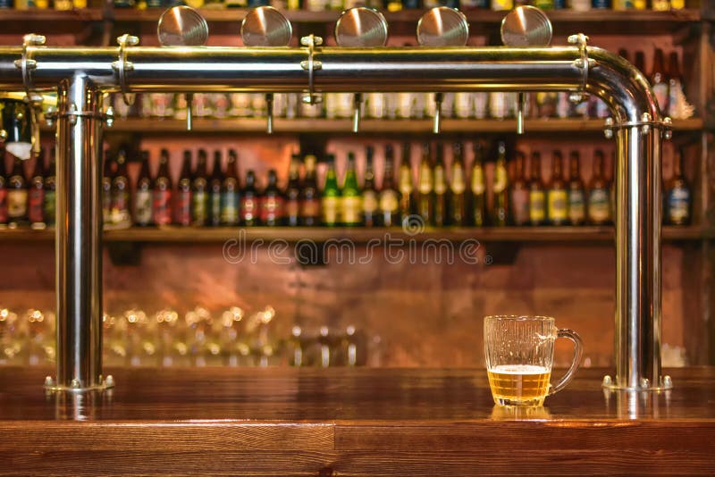 Pint of Beer on a Bar in a Traditional Style Pub Stock Photo - Image of ...