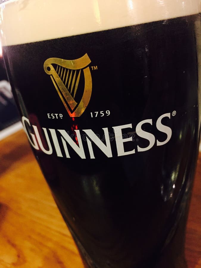 A pint of Guinness editorial stock photo. Image of iron - 81397013